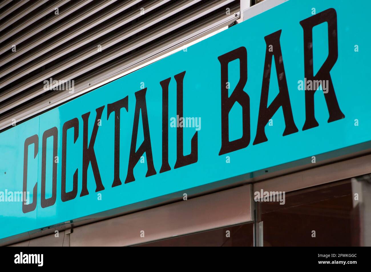 Cocktail bar sign in turquoise and black Stock Photo - Alamy