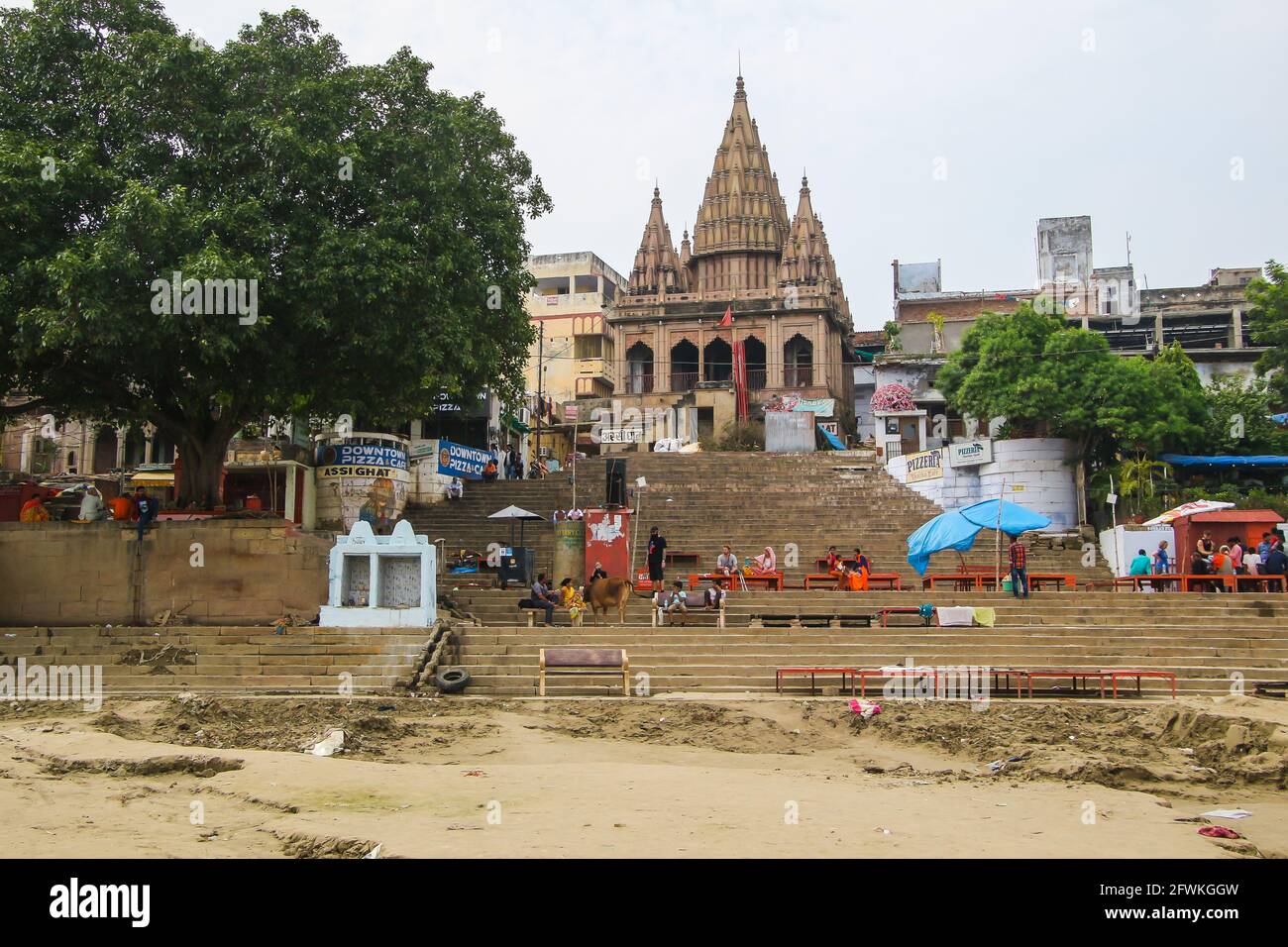 View of Assi Ghat in Varanasi, India, showing mud and sand left from ...
