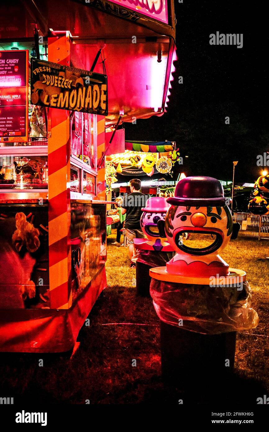 Clown garbage cans at Carnival Stock Photo - Alamy