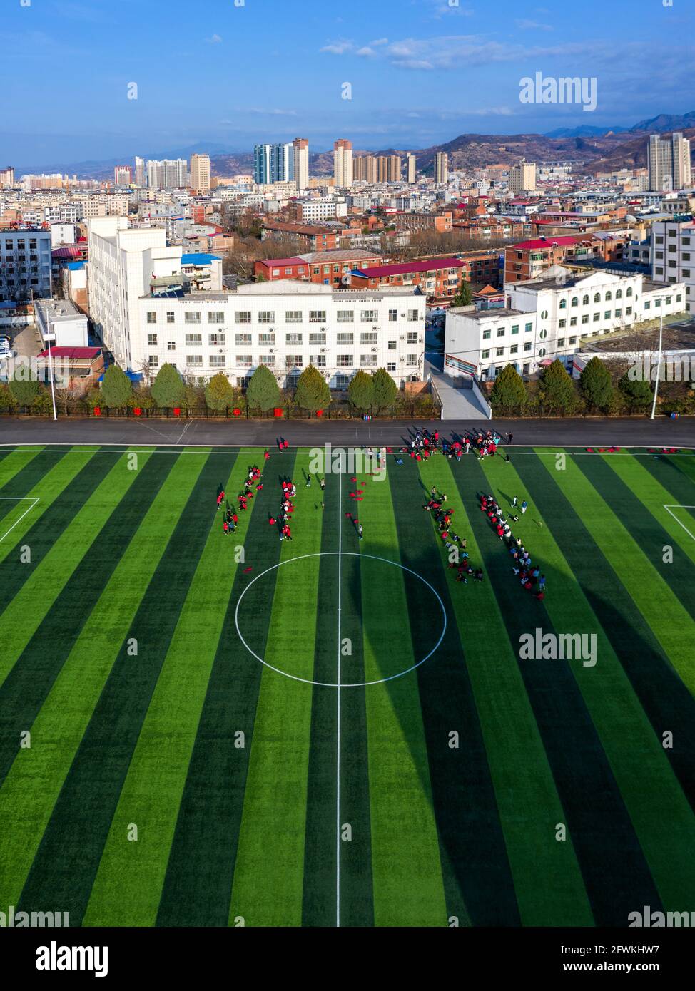 Rural community public welfare football field Stock Photo - Alamy