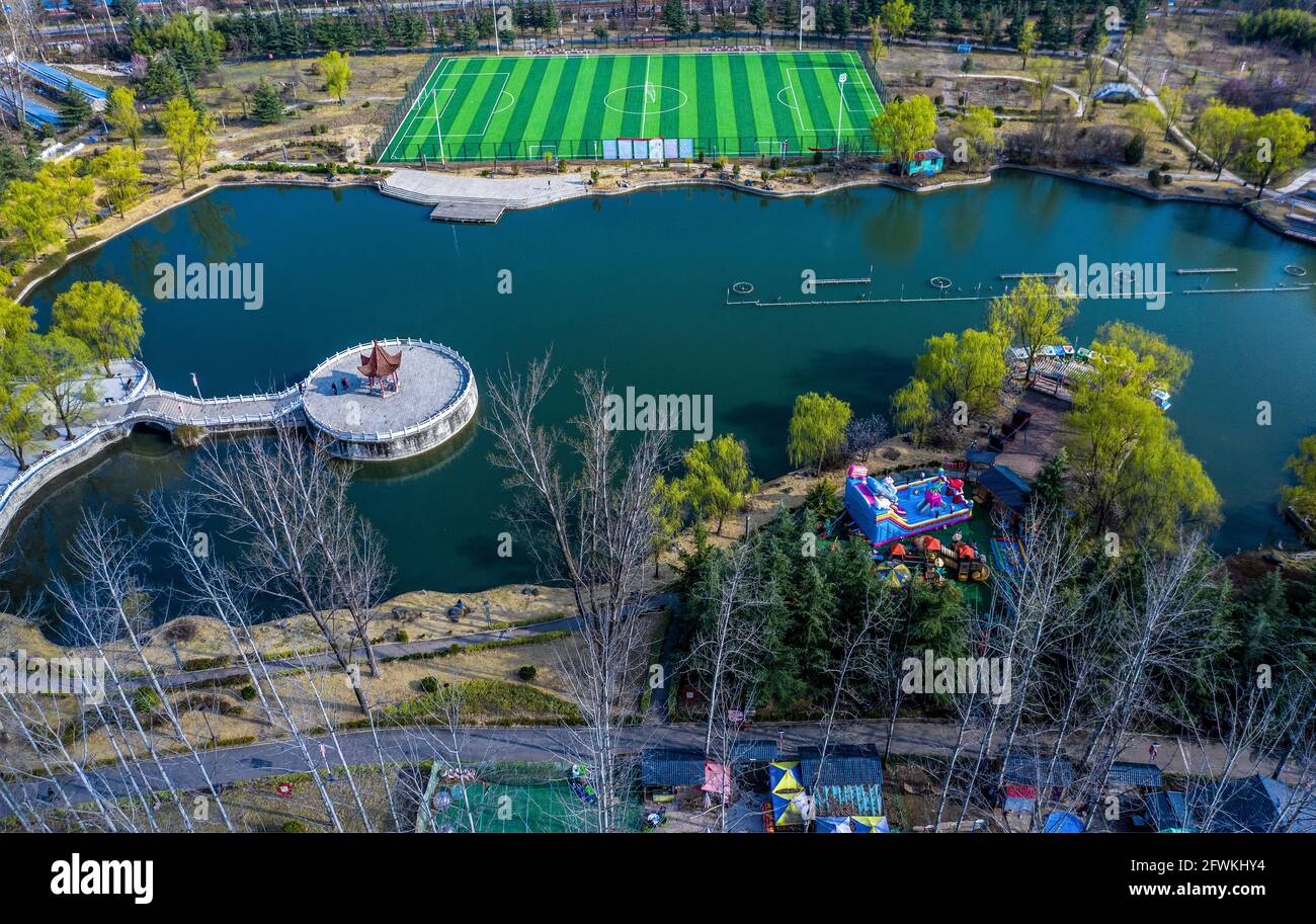 Rural community public welfare football field Stock Photo - Alamy