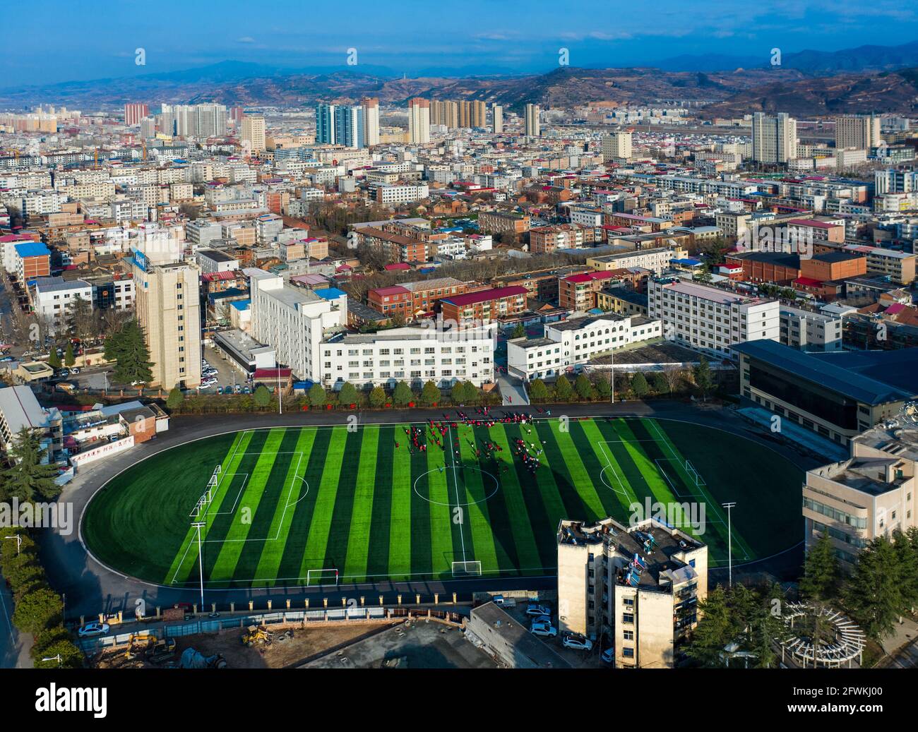Rural community public welfare football field Stock Photo - Alamy