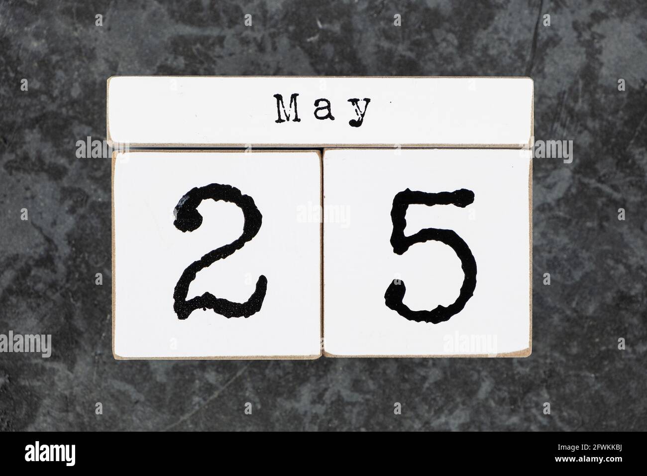 May 25th. May 25 white wooden cube calendar on grey grunge concrete ...