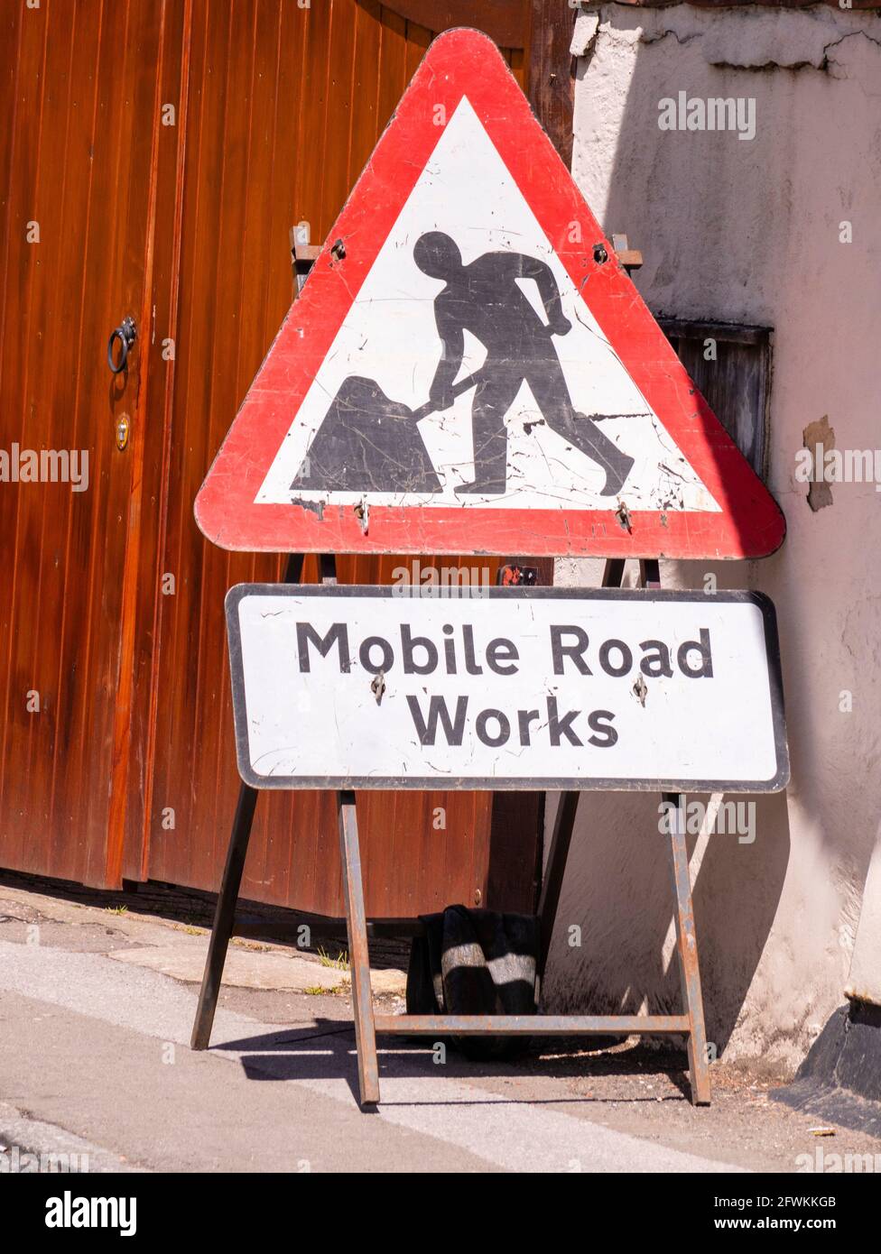 mobile road works sign. sign is not in motion Stock Photo - Alamy