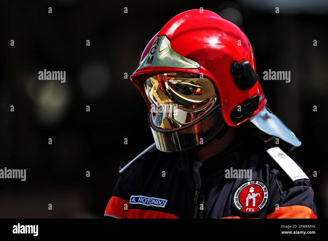 Daniel Ricciardo (AUS) McLaren MCL35M reflected in a fire marshal's ...