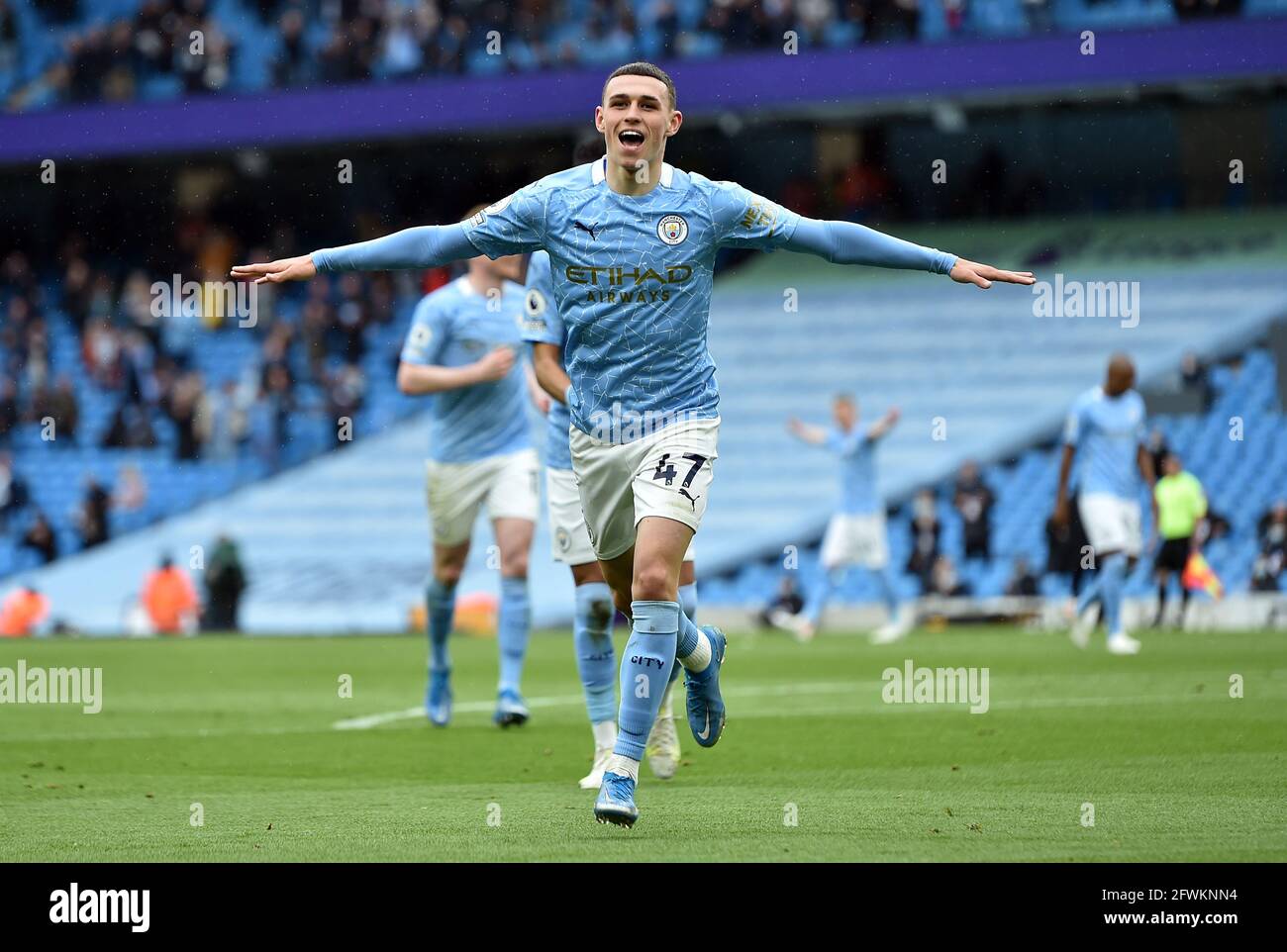 Manchester City's Phil Foden celebrates scoring their side's third goal ...