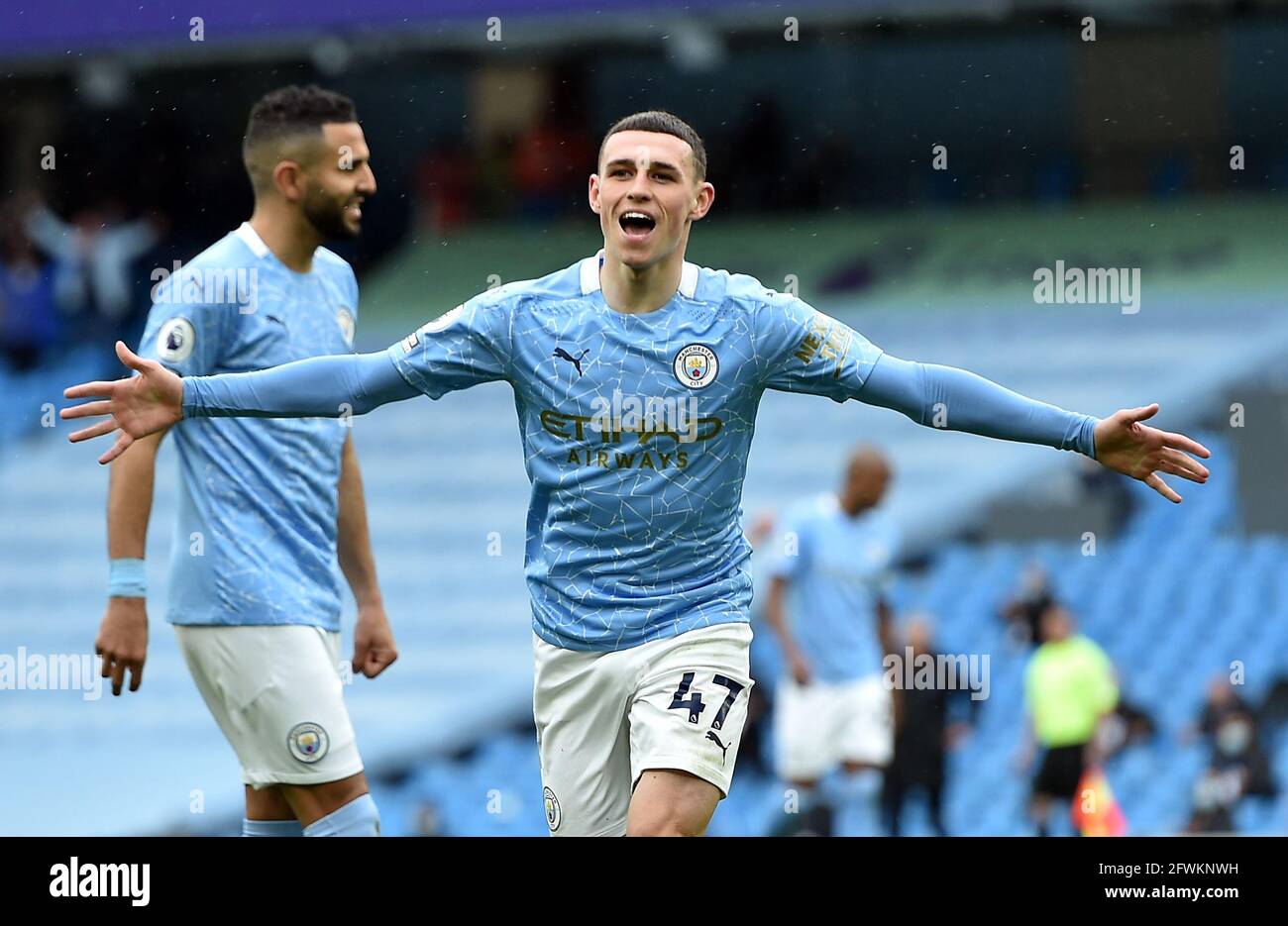 Manchester City's Phil Foden celebrates scoring their side's third goal ...