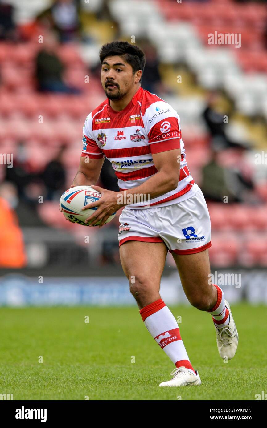 James Bell (13) of Leigh Centurions runs forward with the ball Stock ...