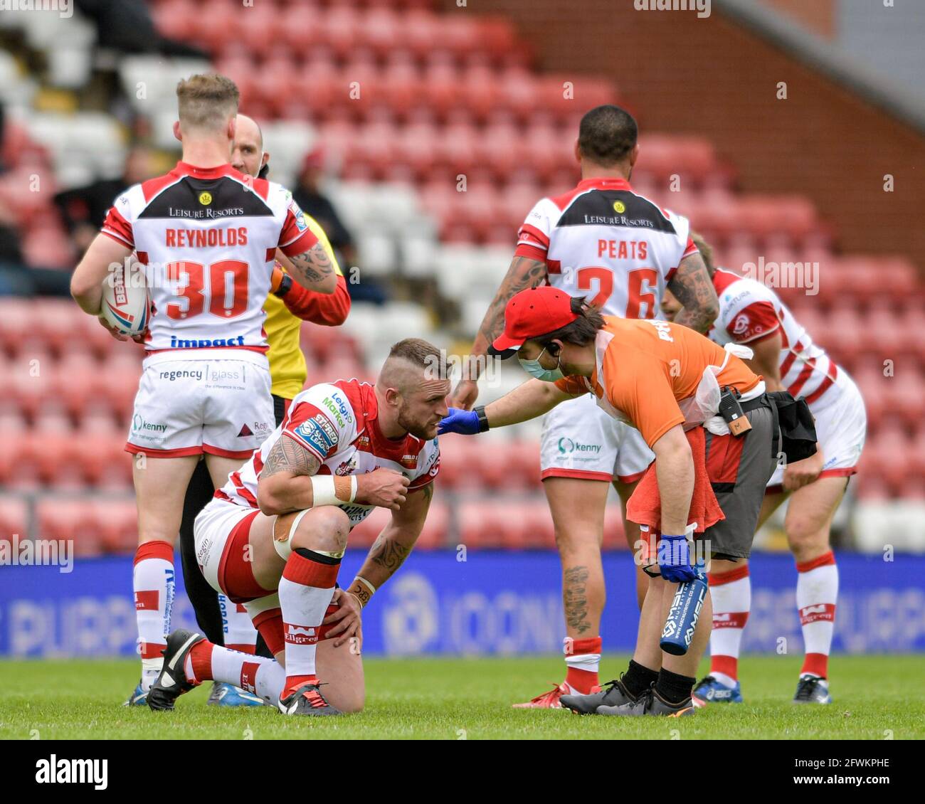Adam Sidlow (20) of Leigh Centurions receives treatment on the pitch ...