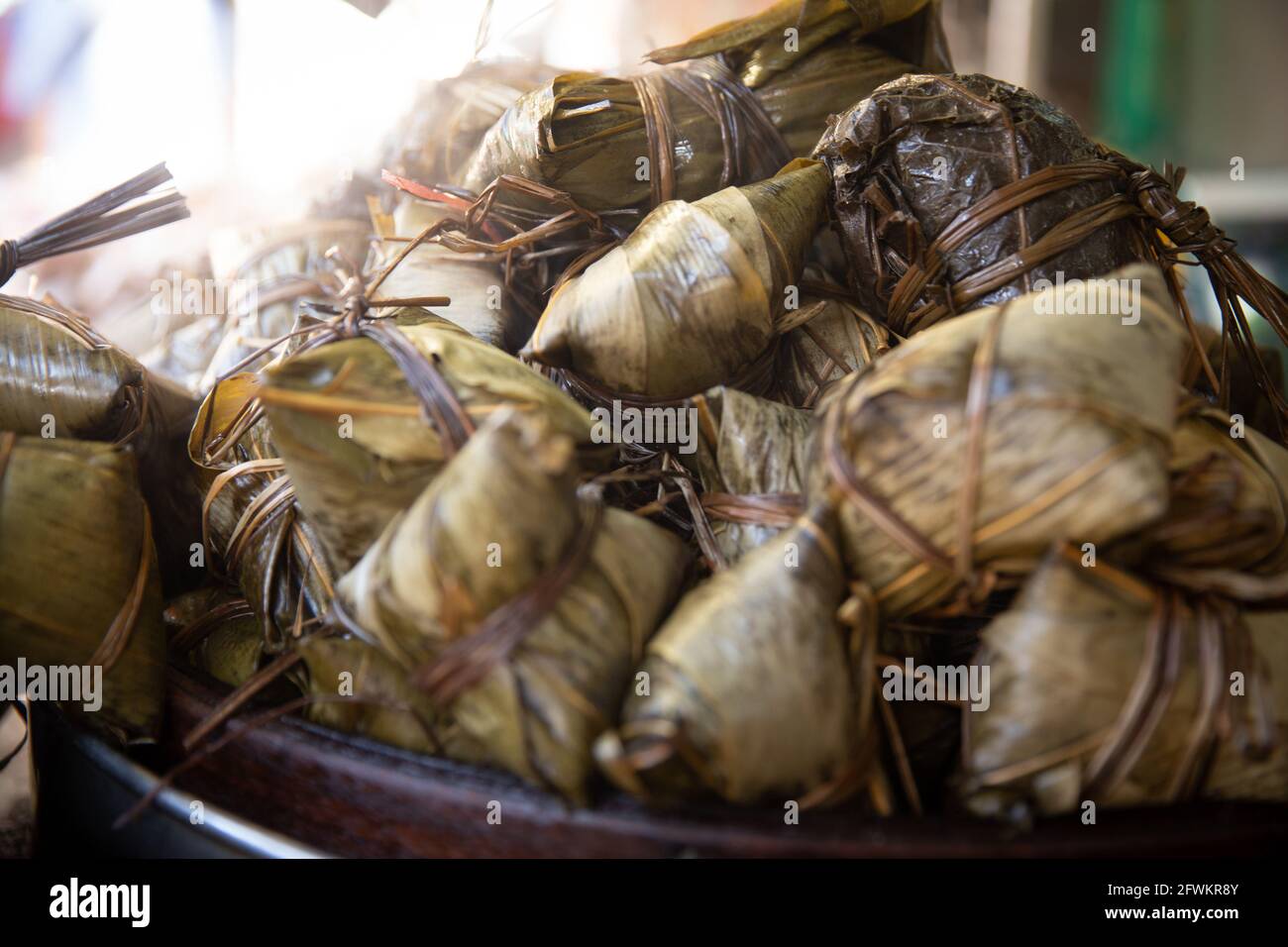 Sticky Rice Wrapped in Banana Leaf Stock Photo - Alamy