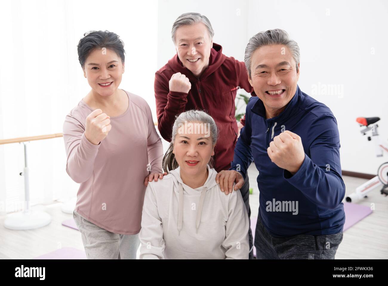 A fitness exercise of the elderly Stock Photo - Alamy
