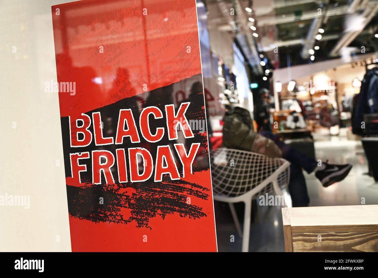 Black friday signs in a store front Stock Photo - Alamy