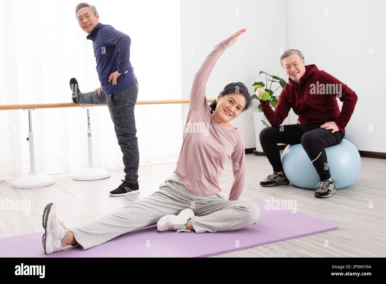 A fitness exercise of the elderly Stock Photo - Alamy