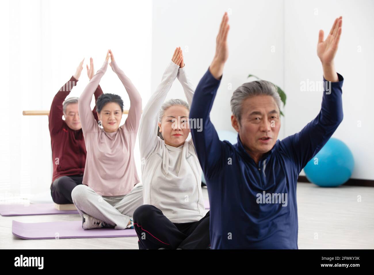 A fitness exercise of the elderly Stock Photo - Alamy