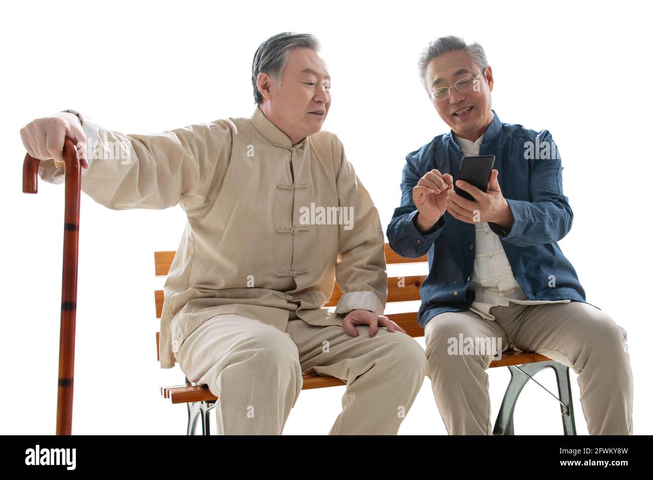 The two old friends see cell phone video Stock Photo - Alamy