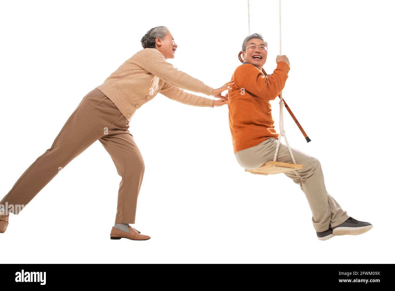 Couple on swing Cut Out Stock Images & Pictures - Alamy