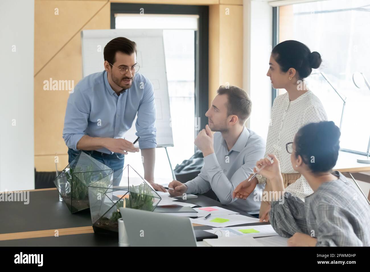 Diverse team employees brainstorming gathering hi-res stock photography ...
