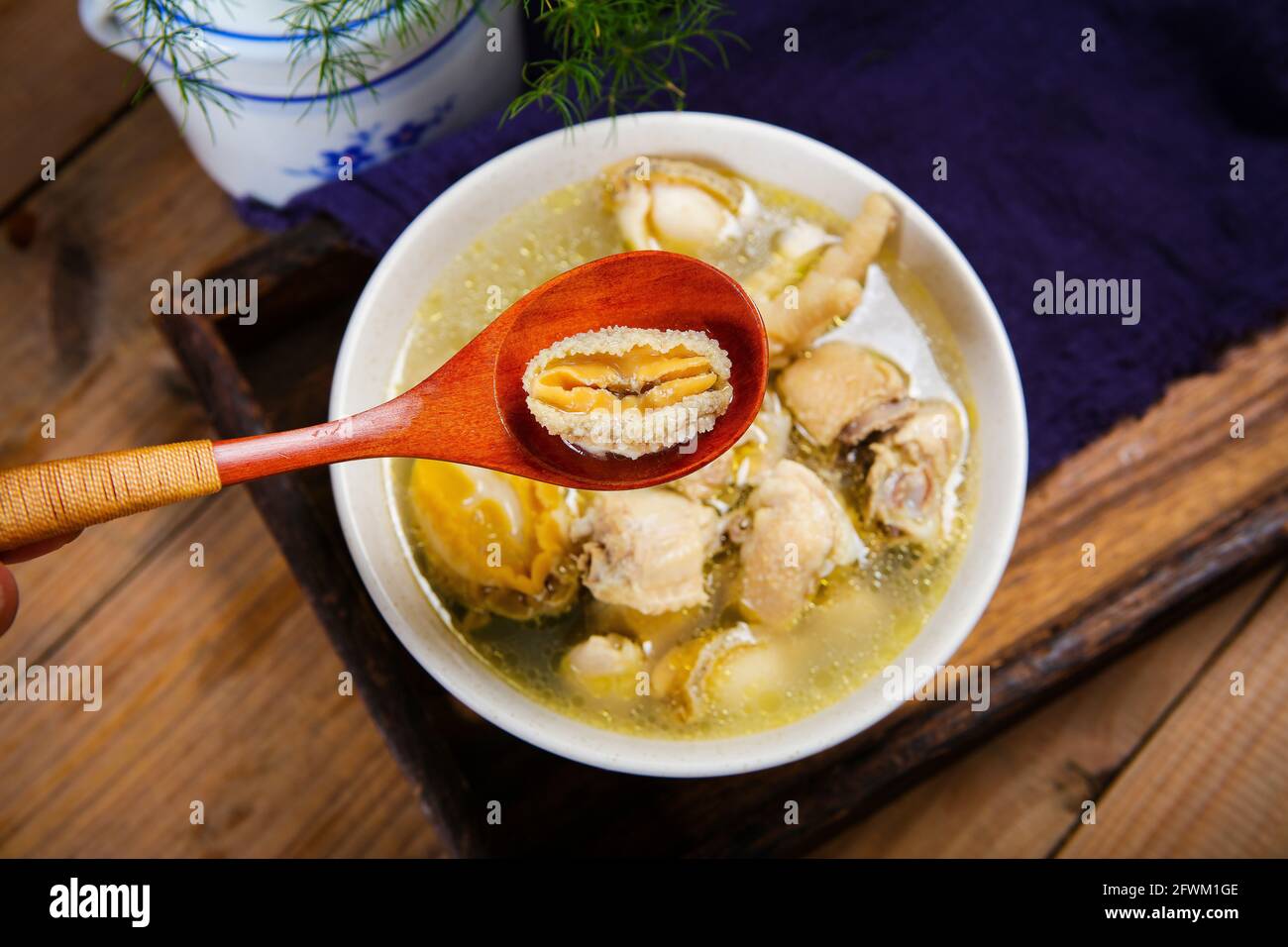 Abalone in clay pot chicken Stock Photo - Alamy