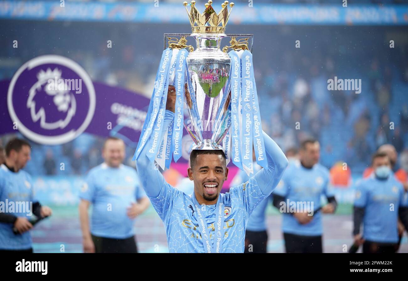 Manchester City's Gabriel Jesus celebrates with the Premier League ...