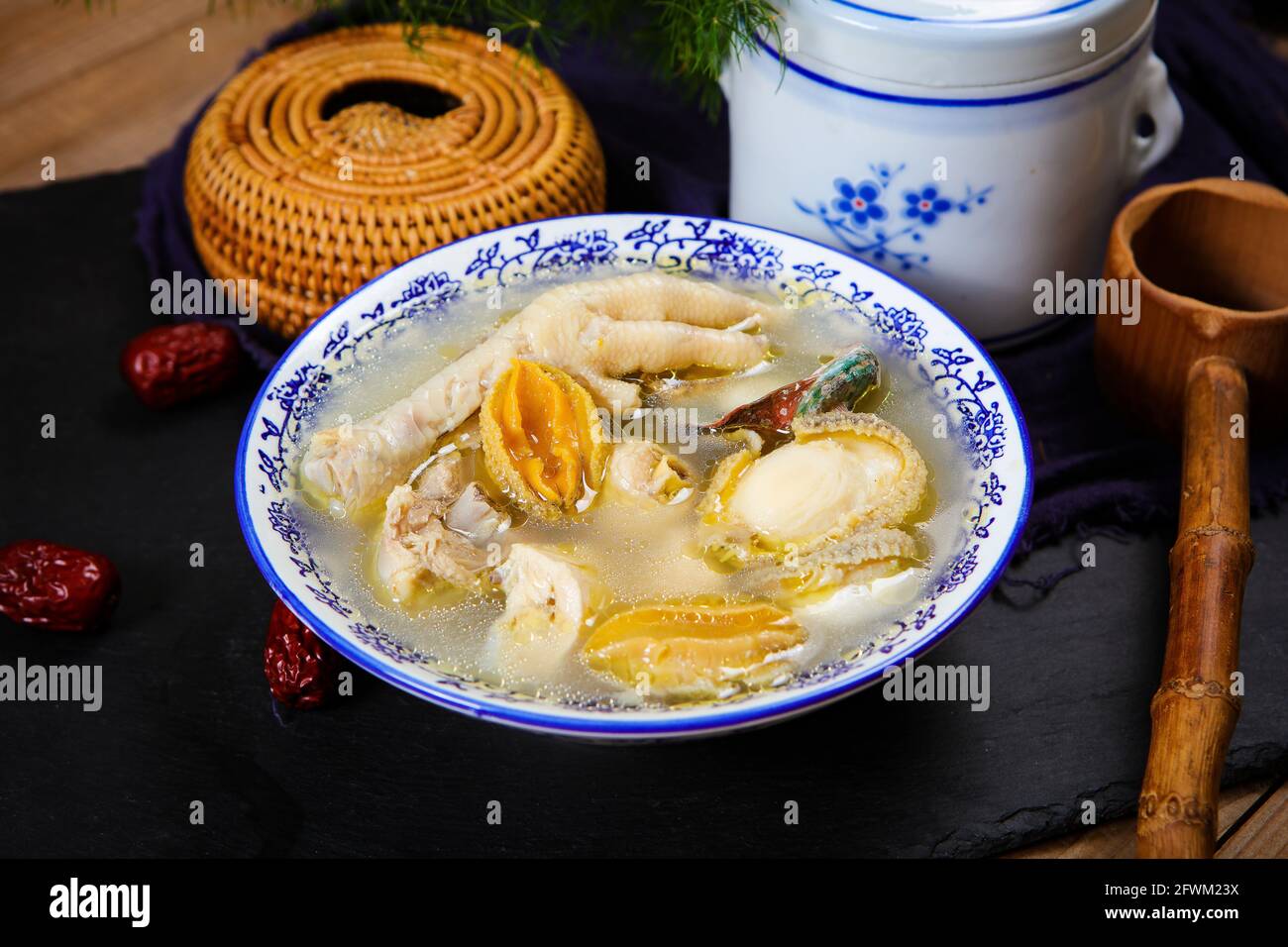 Abalone in clay pot chicken Stock Photo - Alamy