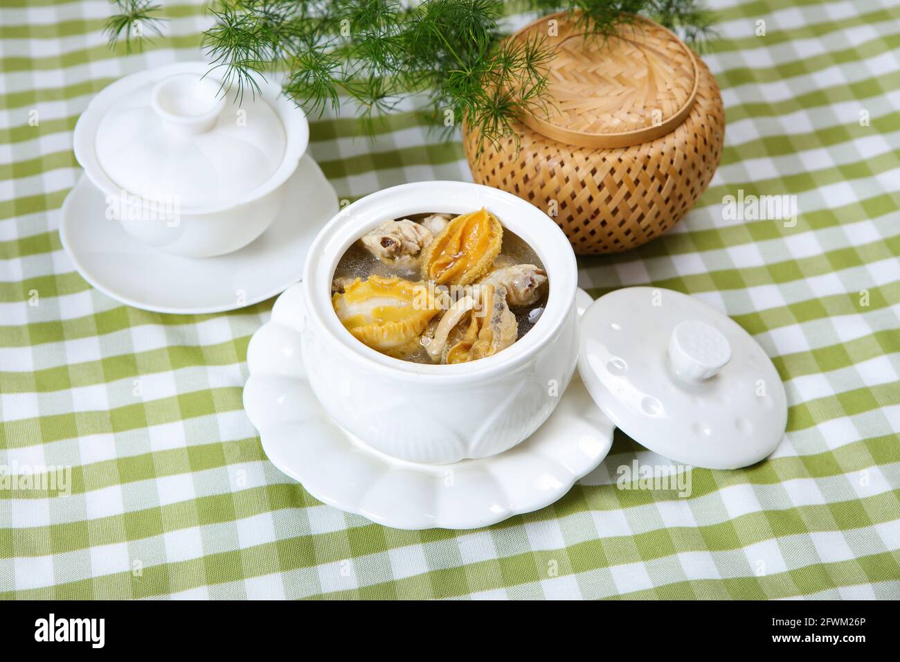 Abalone in clay pot chicken Stock Photo - Alamy