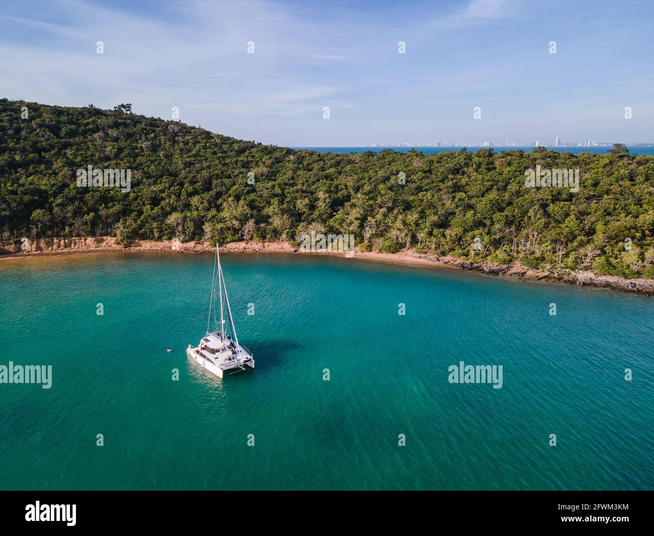 Aerial view of private yacht cruising on tropical sea at evening Stock ...
