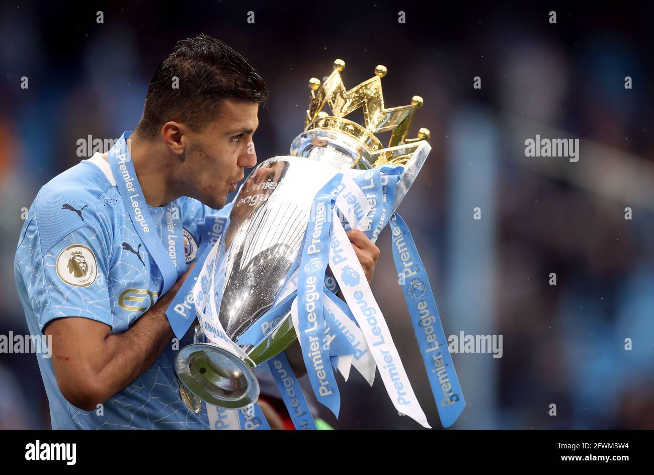Manchester City's Rodri with the trophy after the Premier League match ...