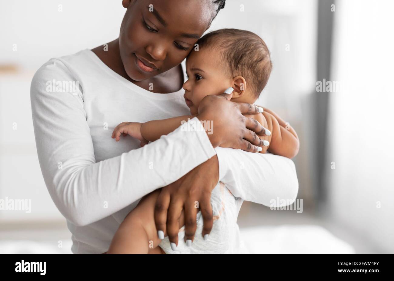 Scared african american mom and child hi-res stock photography and ...