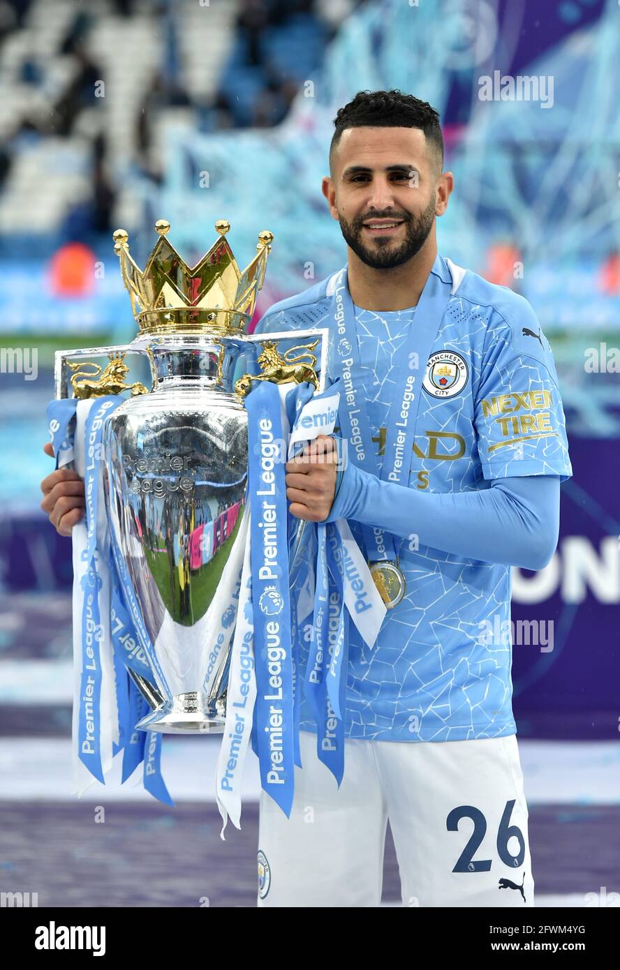 Manchester City's Riyad Mahrez celebrates with the trophy after the ...