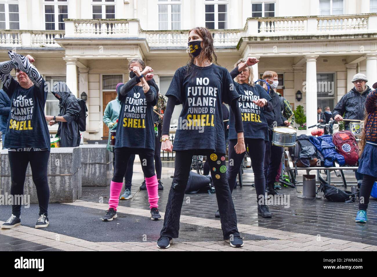 Extinction Rebellion protesters perform outside the Science Museum in ...