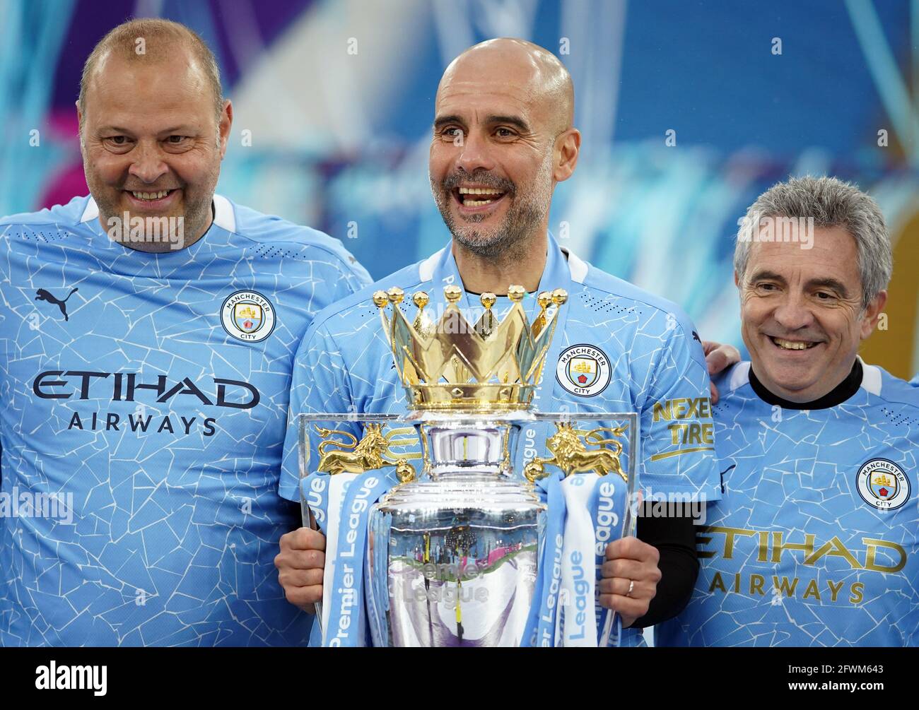 Manchester City manager Pep Guardiola (centre), coach Rodolfo Borrell ...