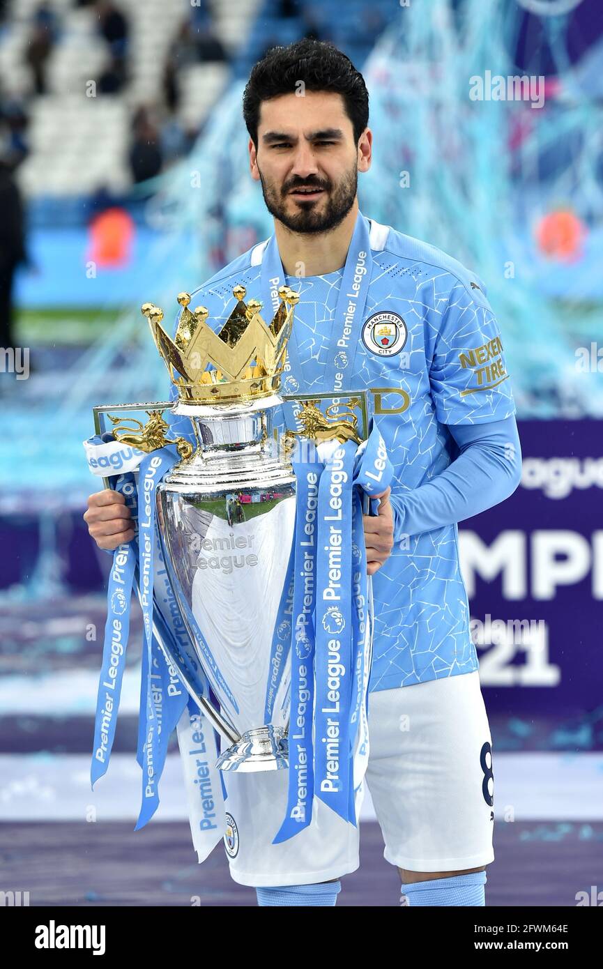 Manchester City's Ilkay Gundogan celebrates with the trophy after the ...