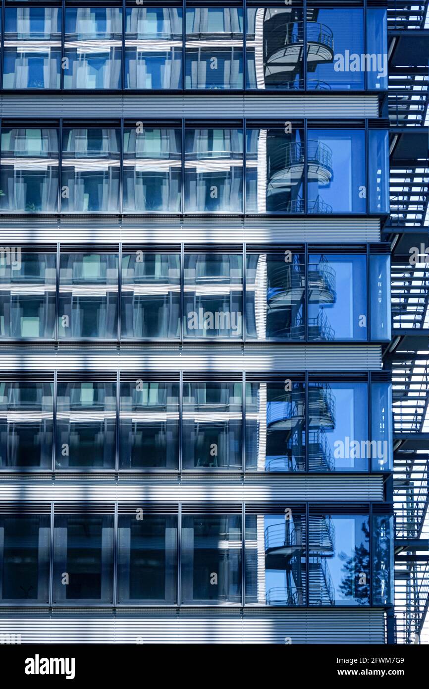 Reflections in the windows, in a detail view of the Telekom Center ...