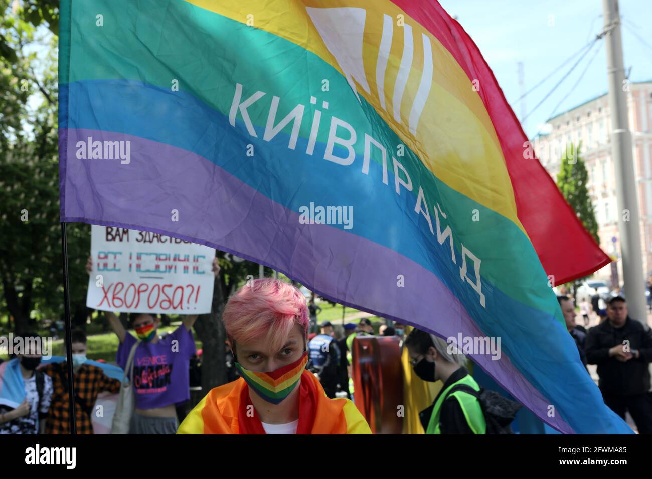 KYIV, UKRAINE - MAY 22, 2021 - A demonstrator with the KyivPride flag is pictured during the ...