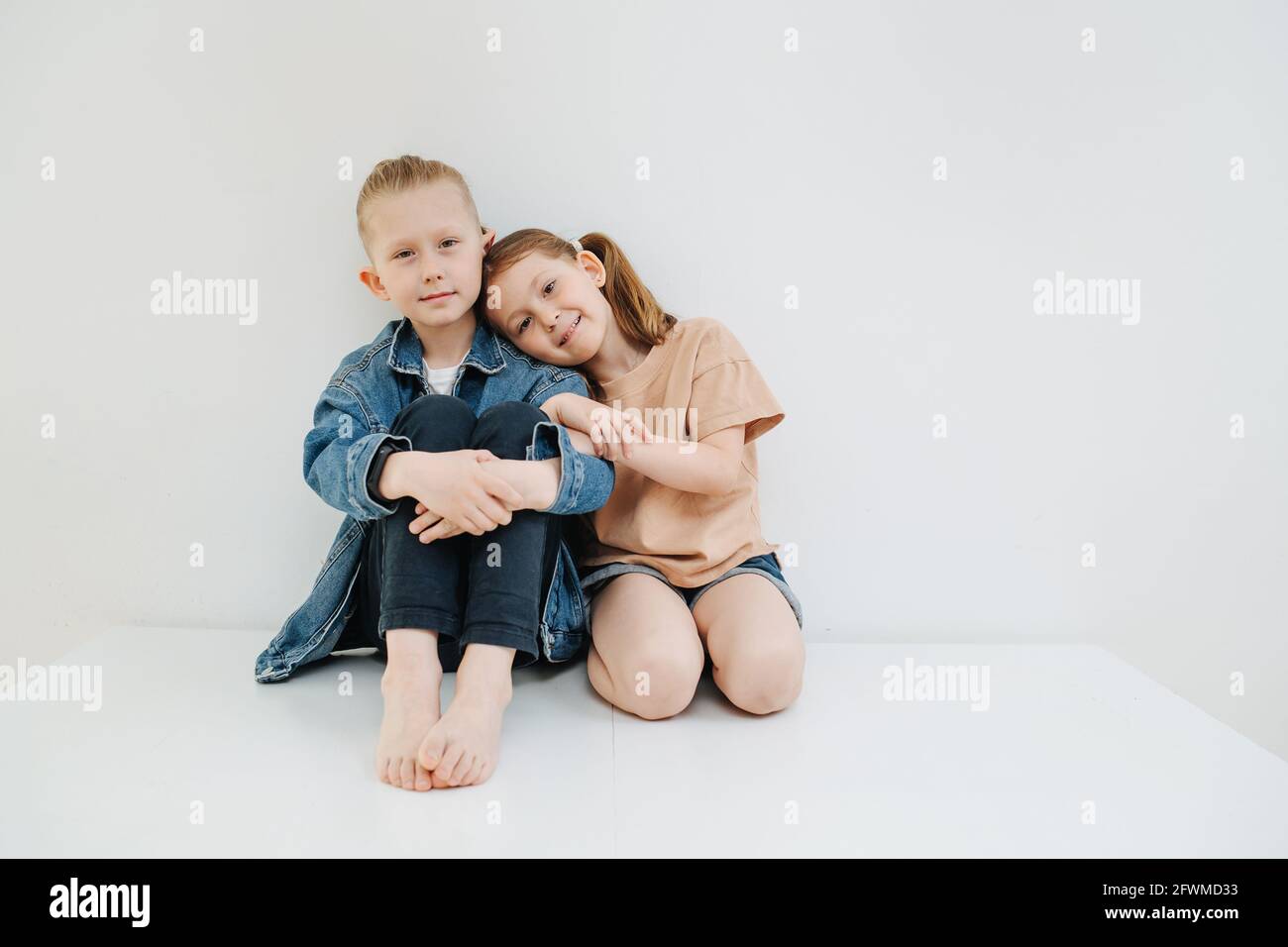 Male and female sitting next to each other hi-res stock photography and ...