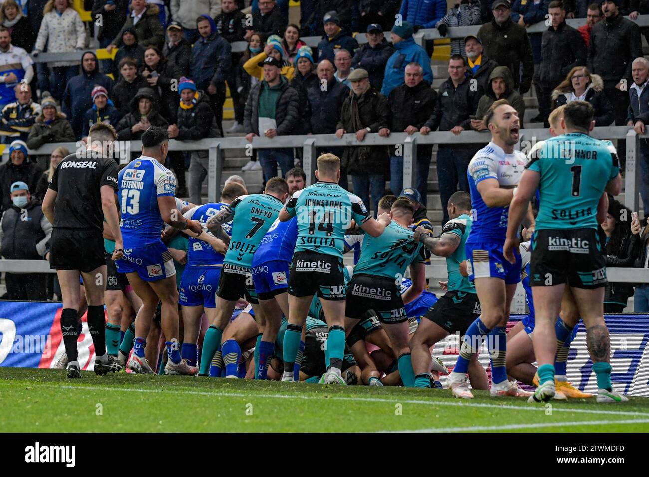 Players from both teams clash on the pitch Stock Photo - Alamy