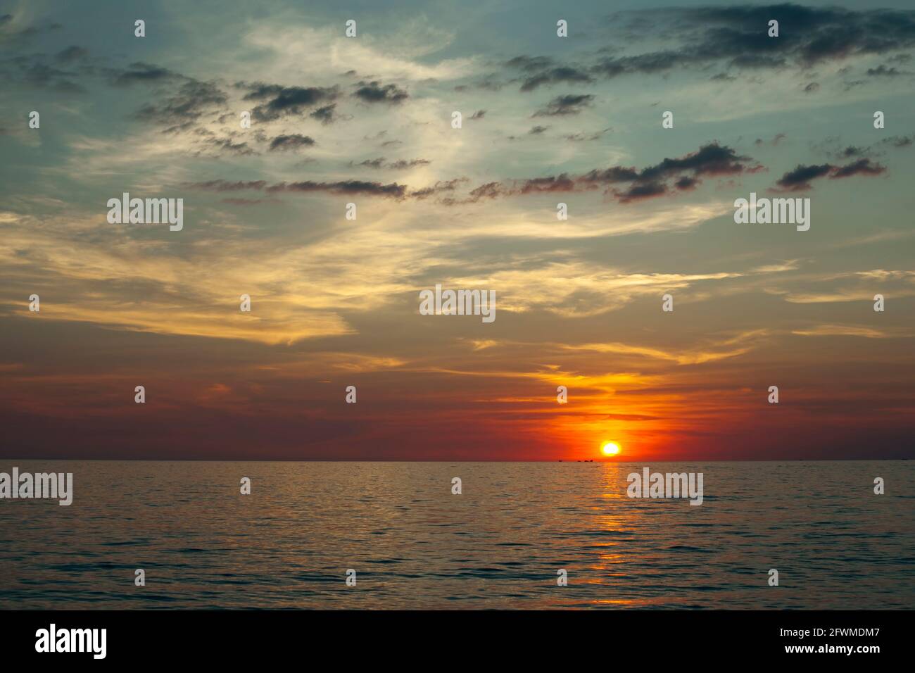 Ocean surf on the beach during beautiful sunset Stock Photo - Alamy