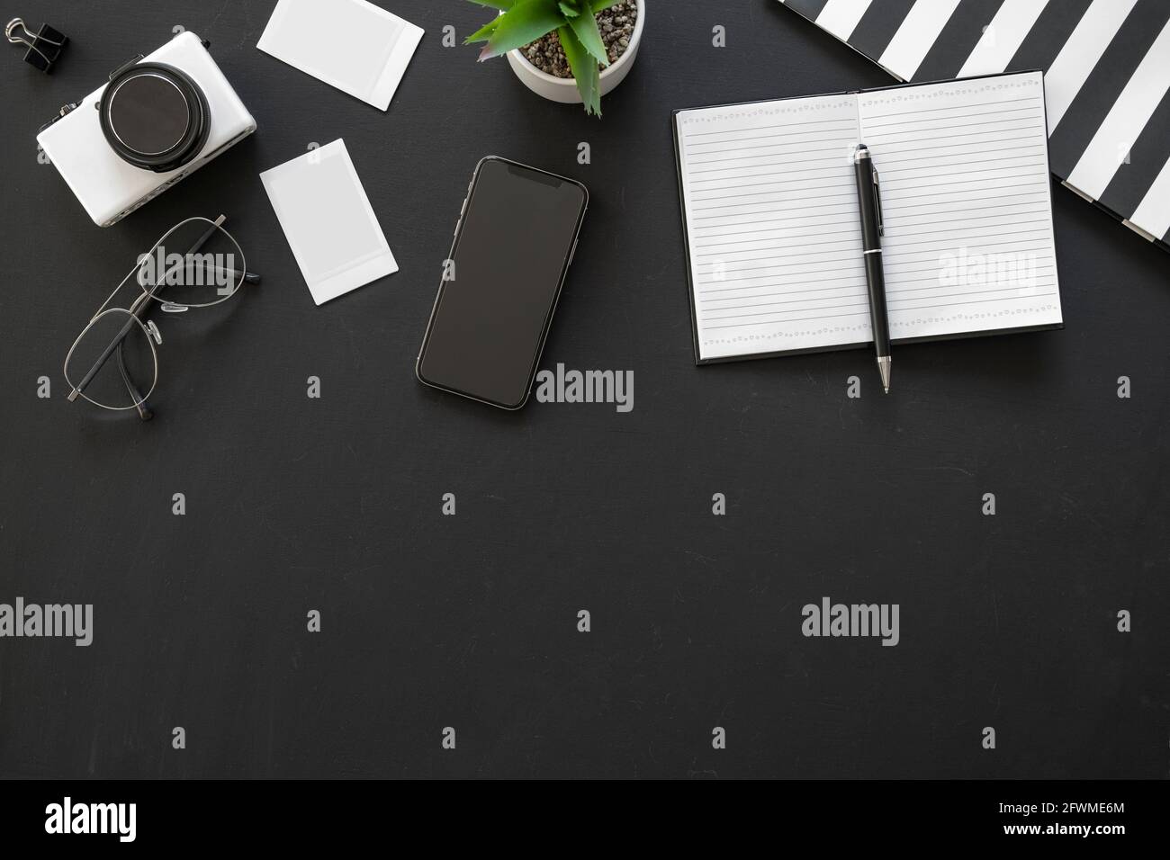 Office black workspace with office supplies and copy space on black ...