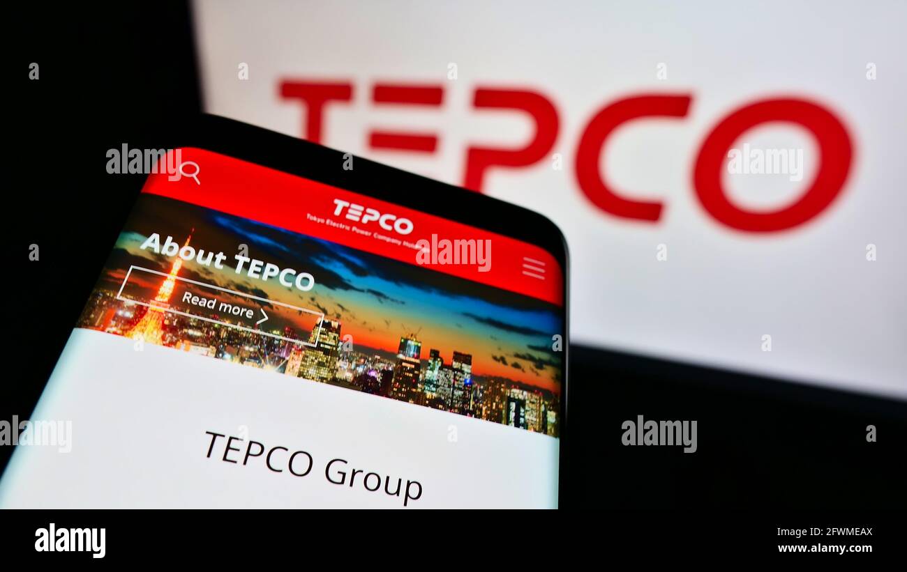 Mobile phone with webpage of Tokyo Electric Power Company Holdings Inc ...