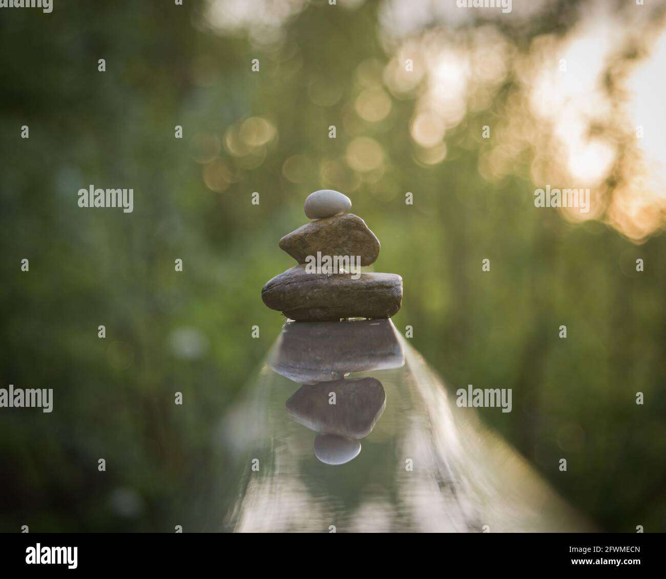 Stone sculpture on perfect reflection Stock Photo - Alamy