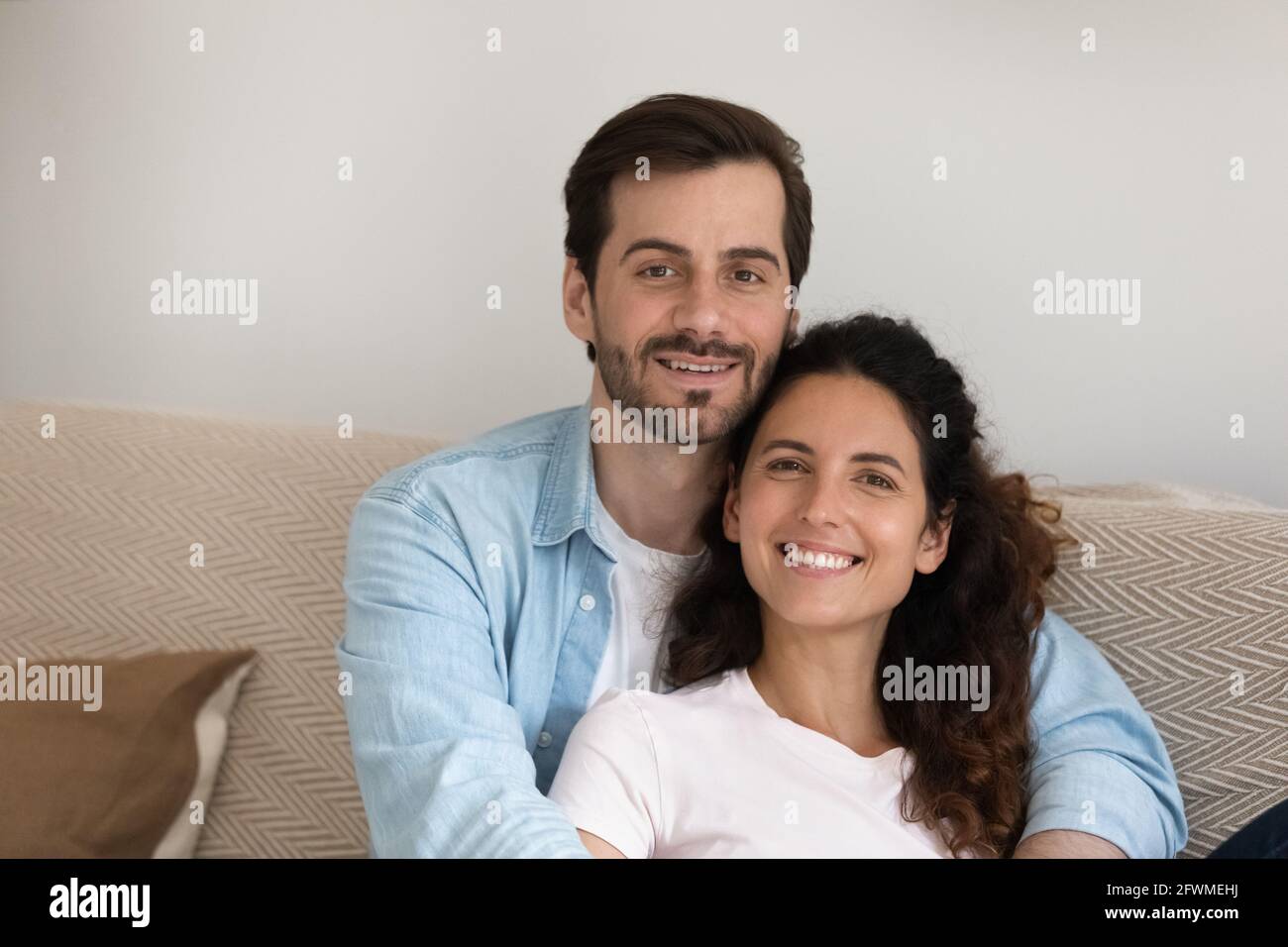 Head shot portrait of relaxed millennial family couple Stock Photo - Alamy