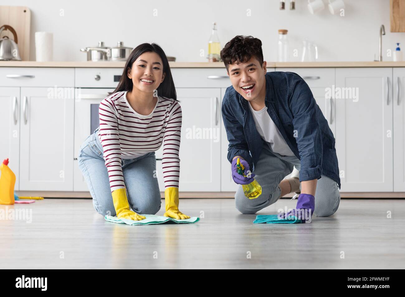 Young asian cleaning floor hi-res stock photography and images - Alamy