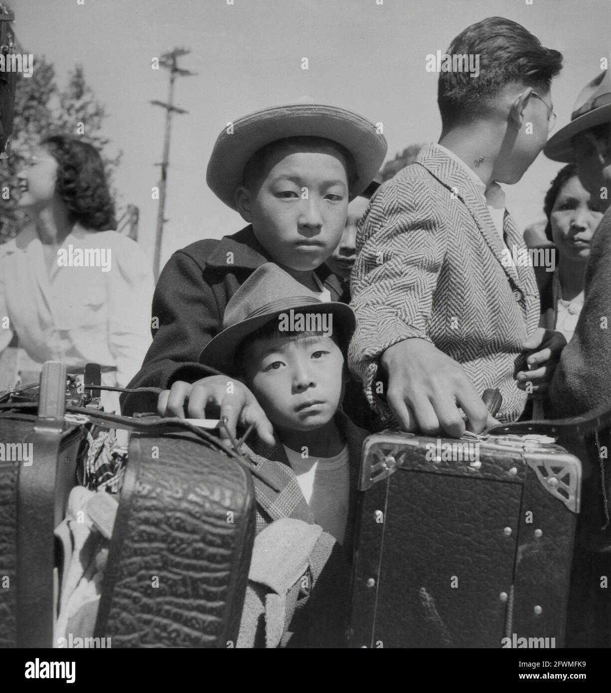 Japanese American Interment family being processed during World War Two ...