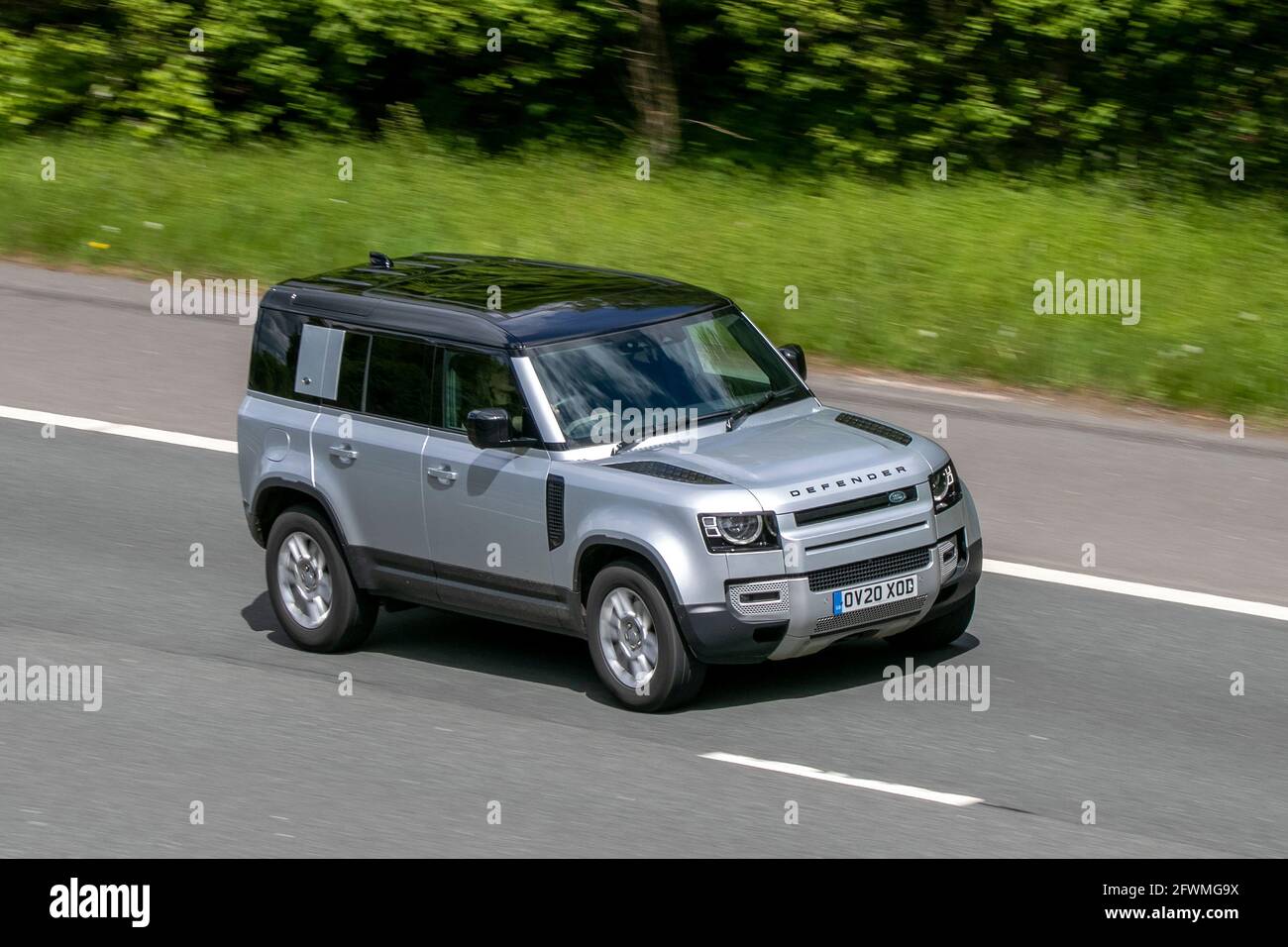LAND ROVER DEFENDER FIRST EDITION D AUTO DIESEL driving on the M6 ...