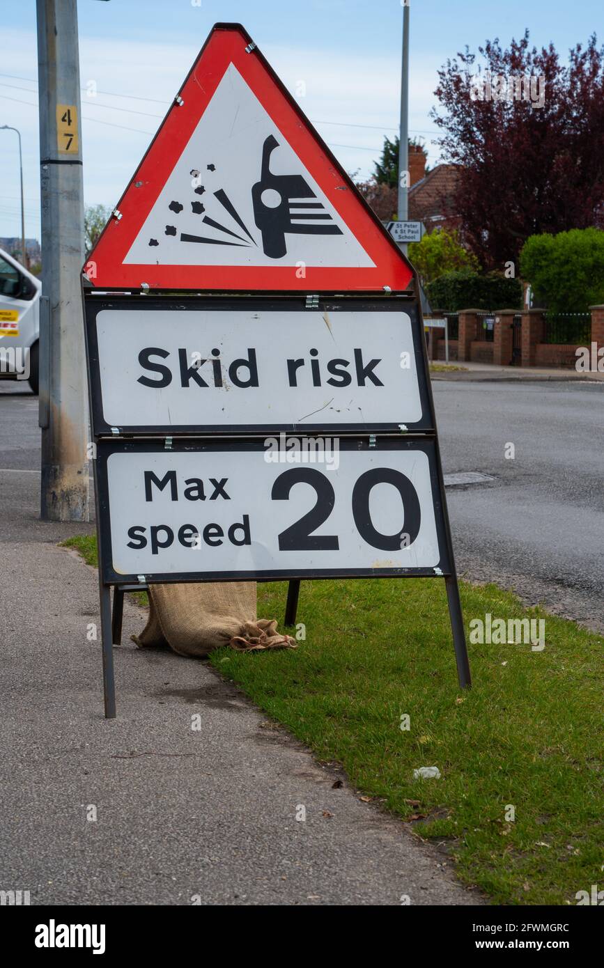 Road works, skid risk, re-surfacing, carriageway, stone chippings, grit ...