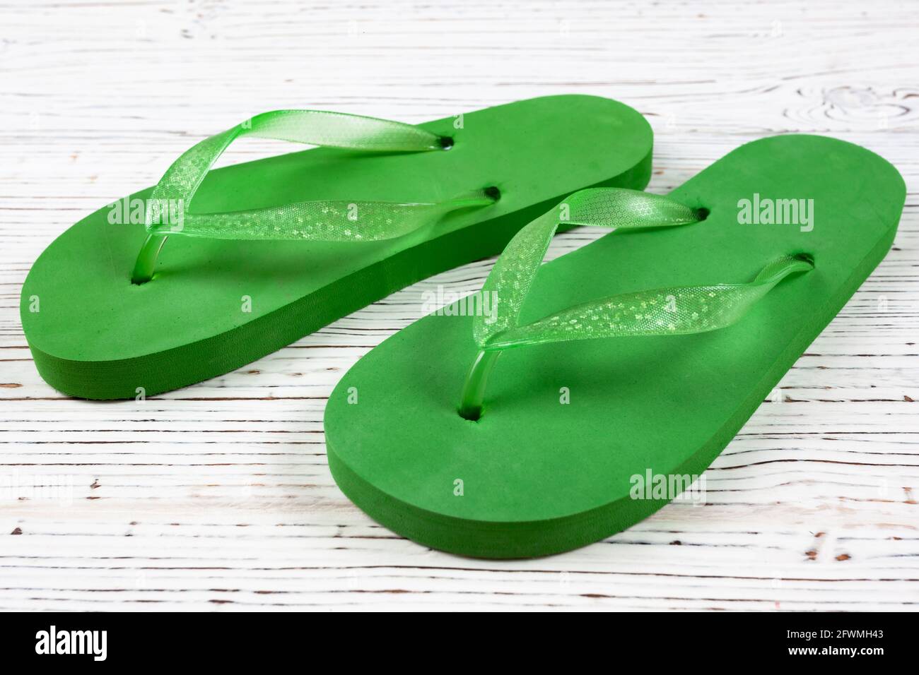 Green slippers on white background hi-res stock photography and images ...