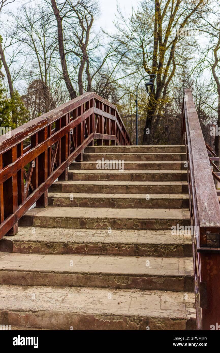 A vertical shot of a bridge with stairs in autumn Stock Photo - Alamy