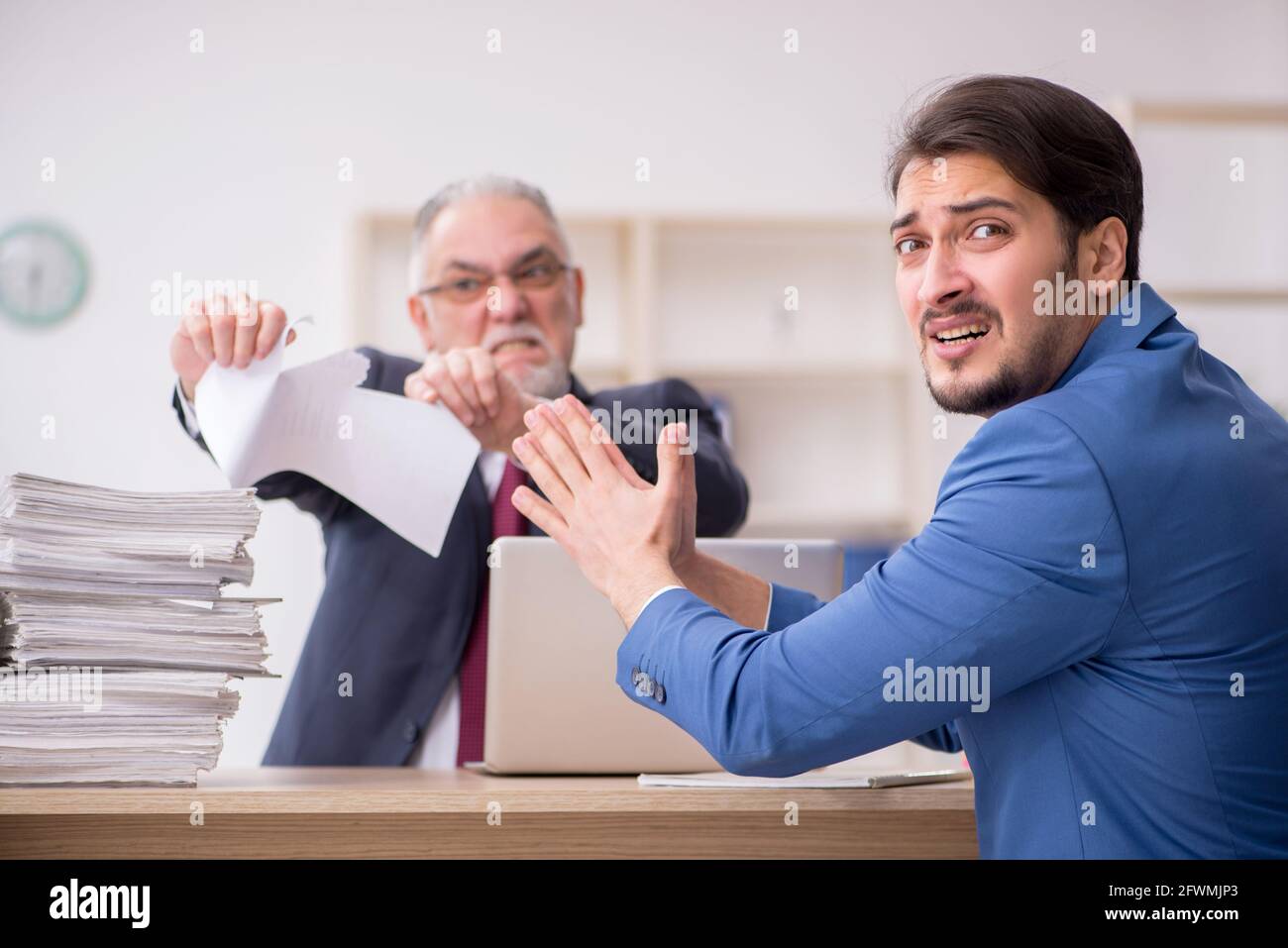 Two employees in dismissal concept Stock Photo - Alamy