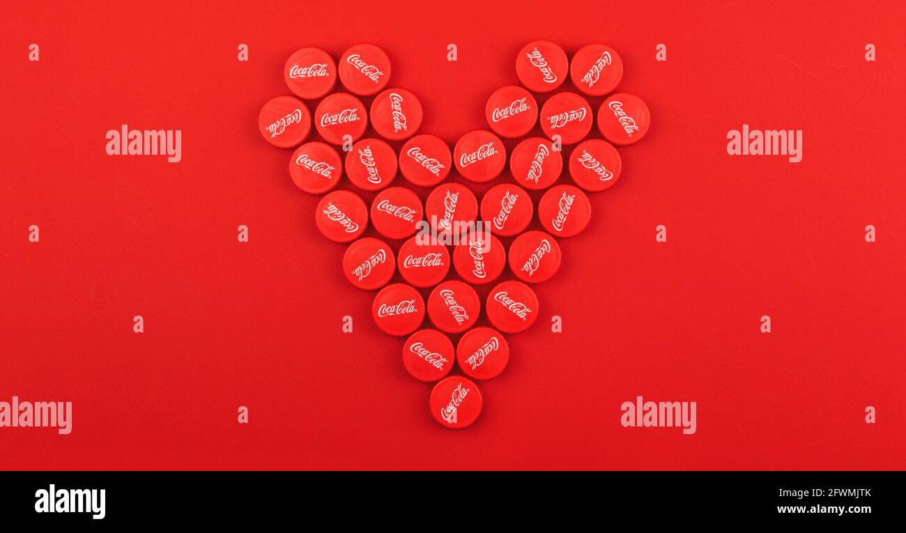 Kharkov, Ukraine - May 16, 2021: A lot of Coca-Cola caps in form of ...