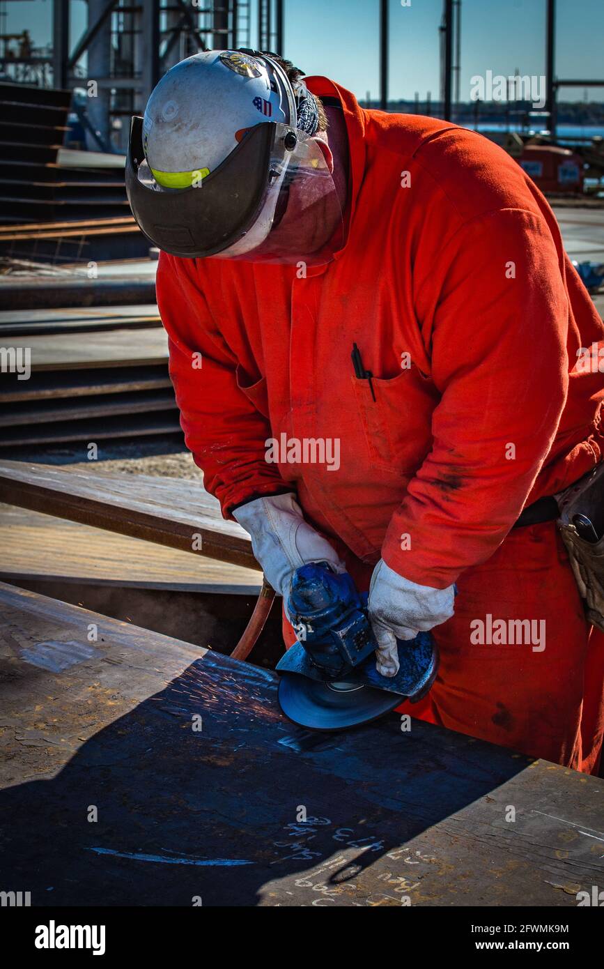 Oil refinery, industrial workers Stock Photo - Alamy